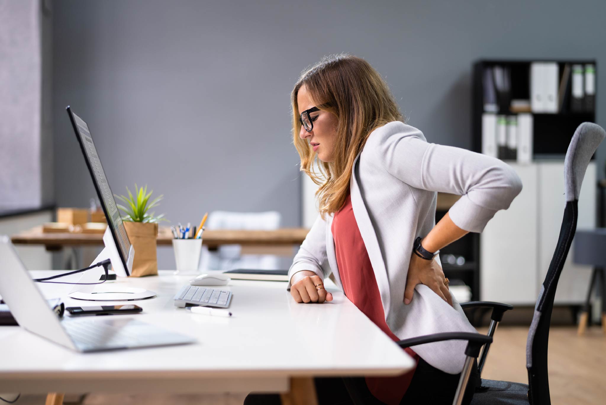 Is Sitting the New Smoking? Fixes for Desk Life | BenchMark PT